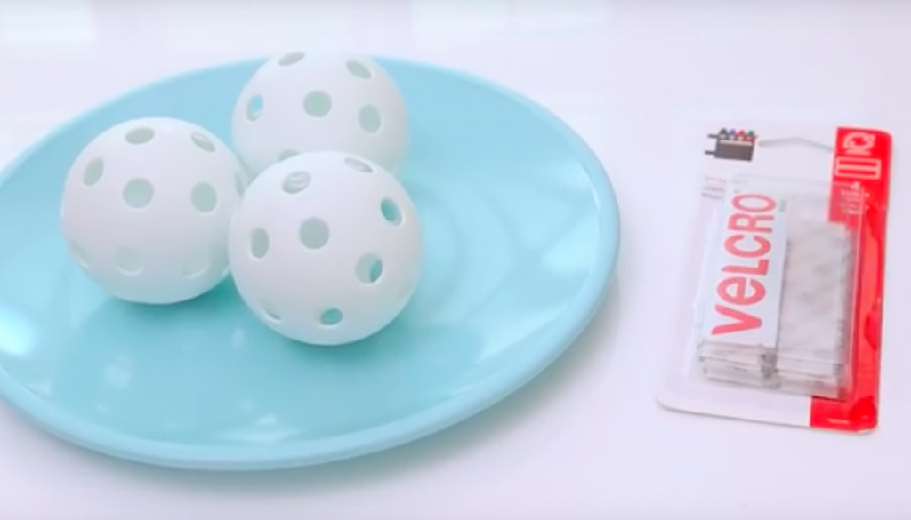 She Is Attaching Velcro Strips To A Wiffle Ball For A Fun DIY Kid's ...