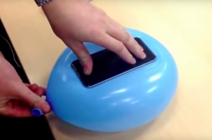 When You Push Your Phone Into A Balloon, Something Very Cool Happens ...