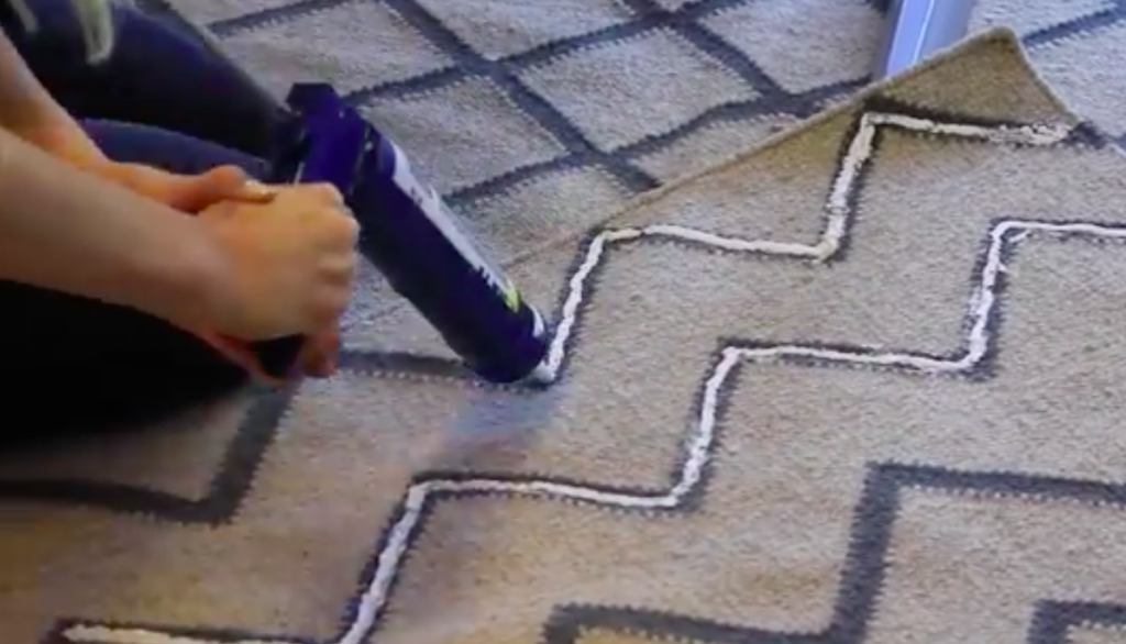 She Is Applying Caulk To The Bottom Of This Rug-What An Awesome Hack ...